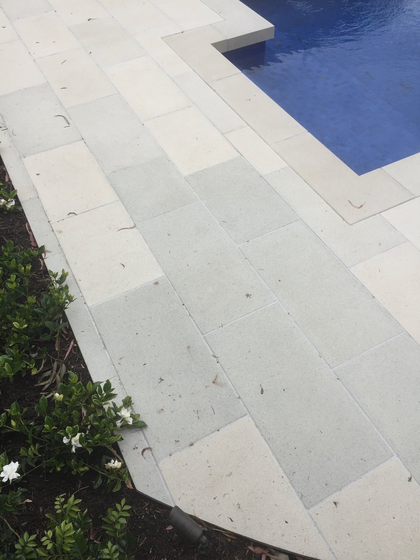 What are the best kind of pavers to use around my pool?
