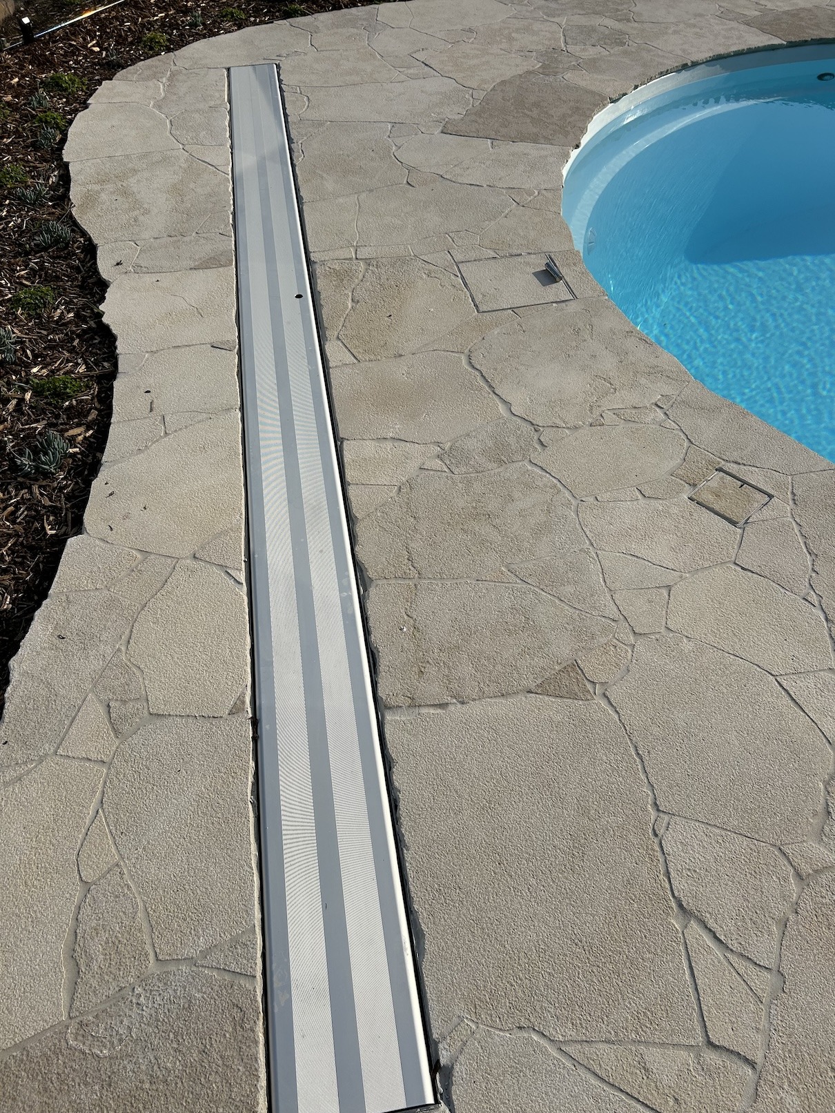 What are the best kind of pavers to use around my pool?